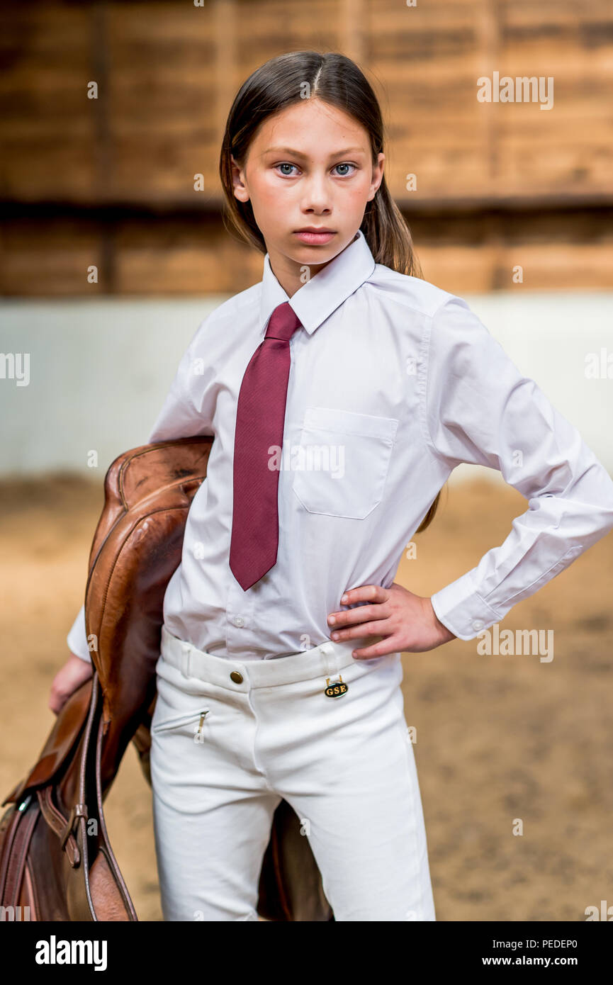 Beautiful child model Bailey works through different looks on a shoot ...