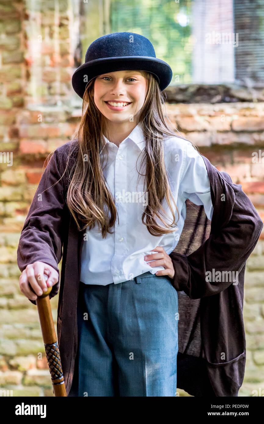 Beautiful child model Bailey works through different looks on a shoot ...