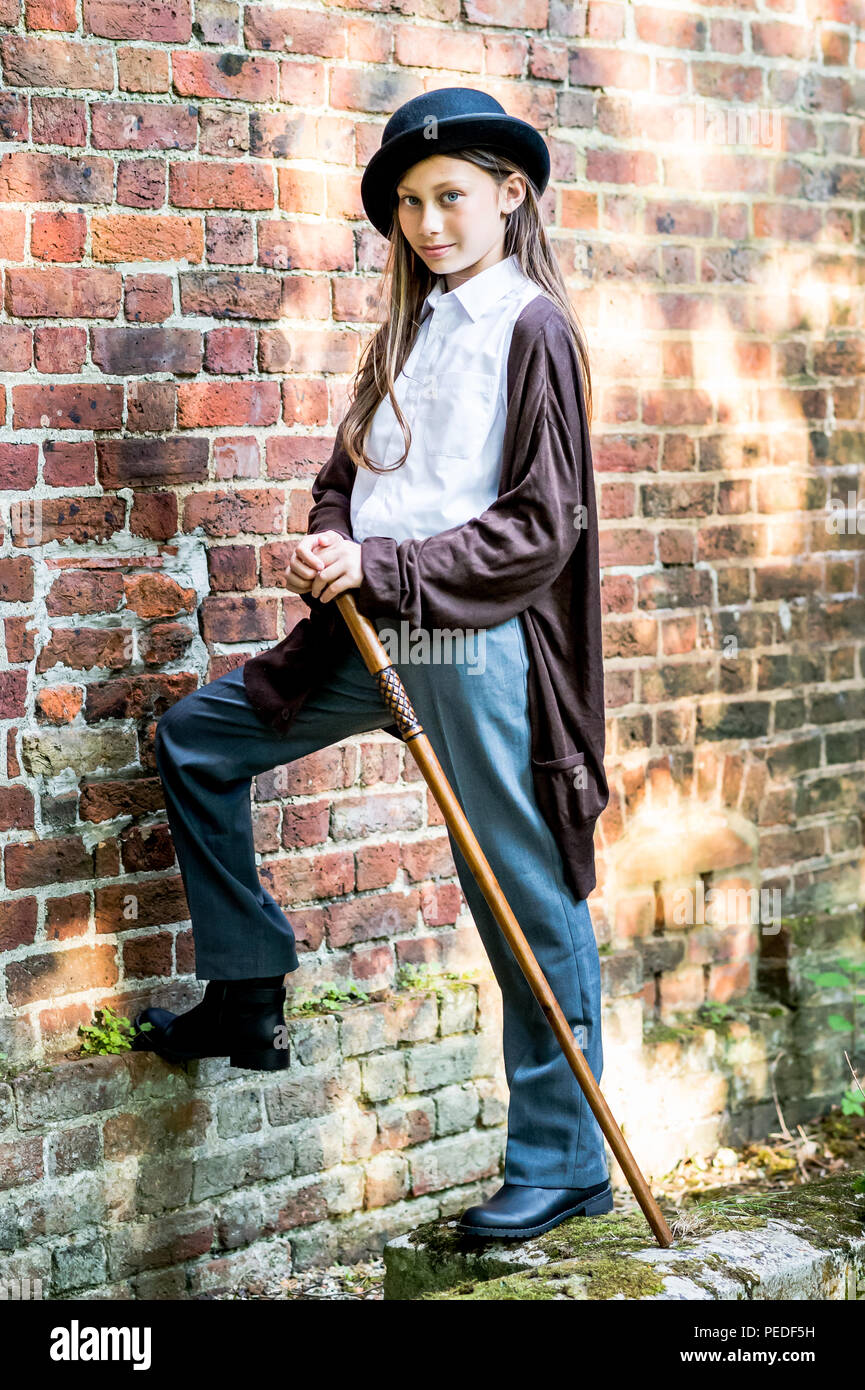 Beautiful child model Bailey works through different looks on a shoot ...