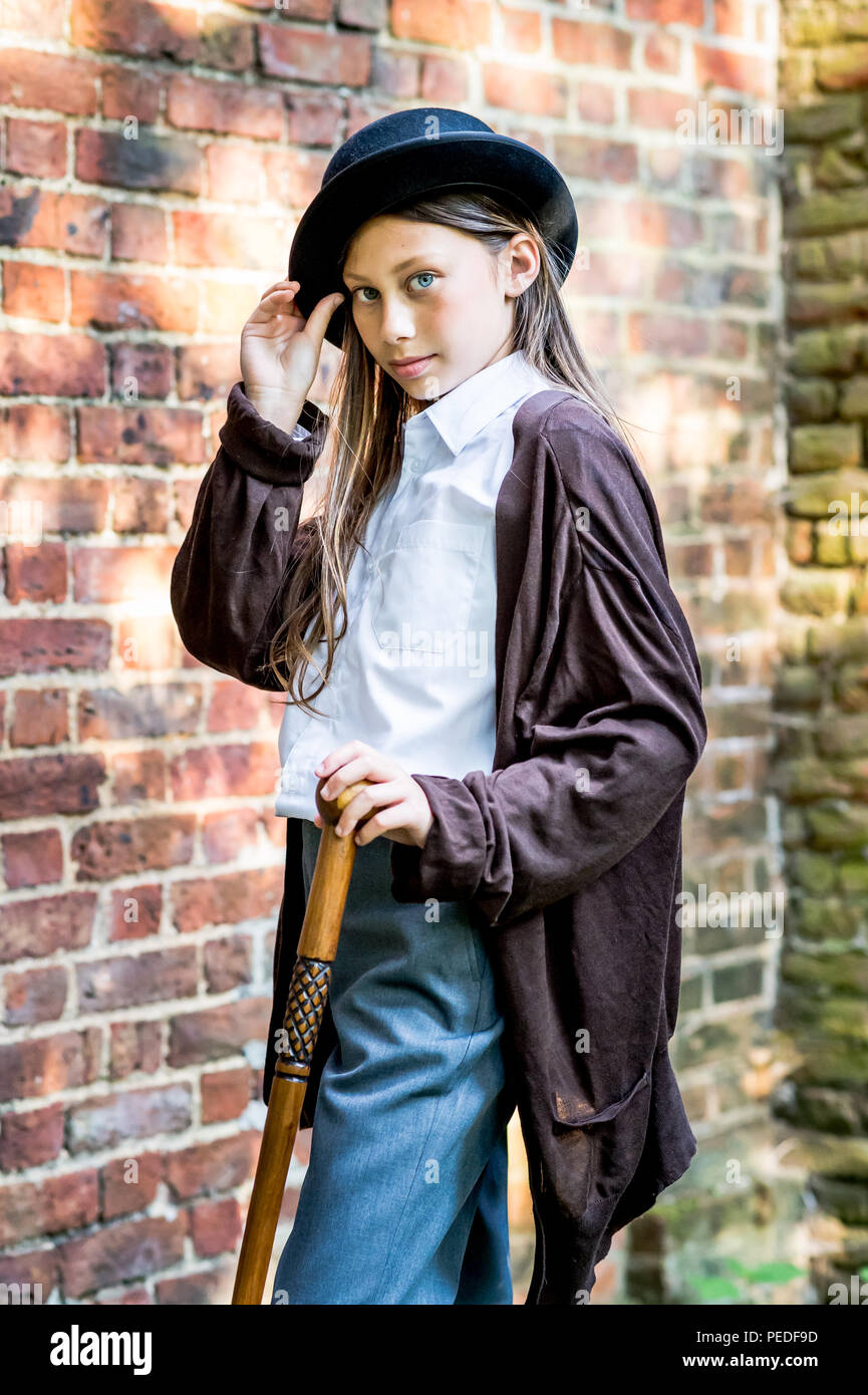 Beautiful child model Bailey works through different looks on a shoot ...