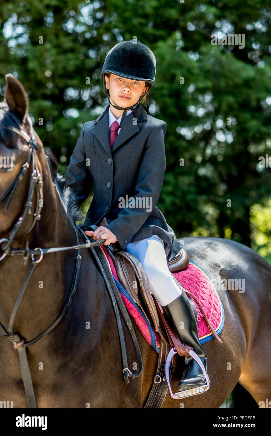 Beautiful child model Bailey works through different looks on a shoot ...