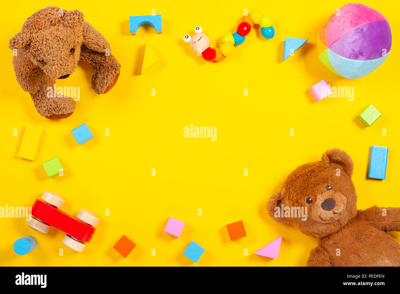 Baby kids toys frame with teddy bear, wooden toy car, colorful bricks ...