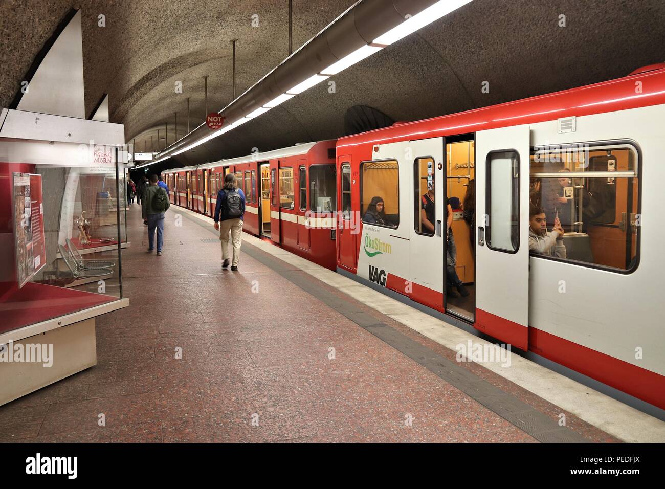 NUREMBERG, GERMANY - MAY 7, 2018: People ride subway train (U-Bahn) by ...