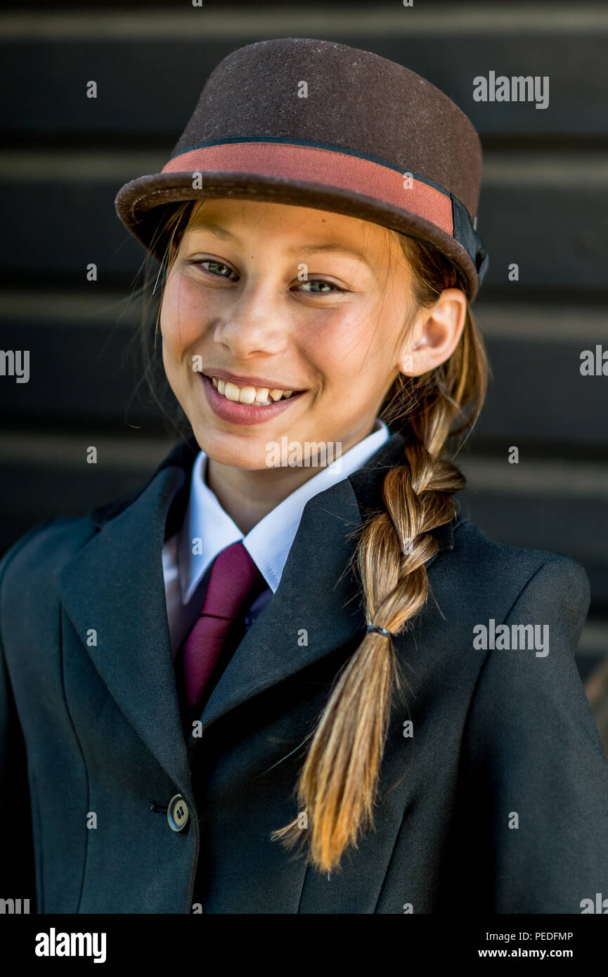 Beautiful child model Bailey works through different looks on a shoot ...