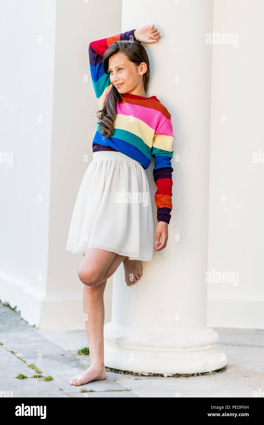 Beautiful child model Bailey works through different looks on a shoot ...