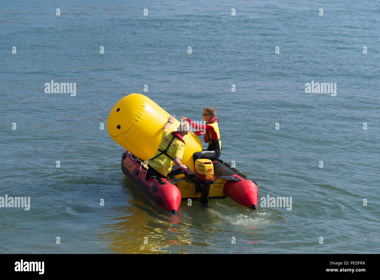 Yellow inflatable boat hi-res stock photography and images - Alamy