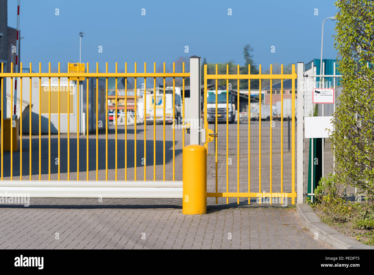 Yellow metal barrier gate hi-res stock photography and images - Alamy