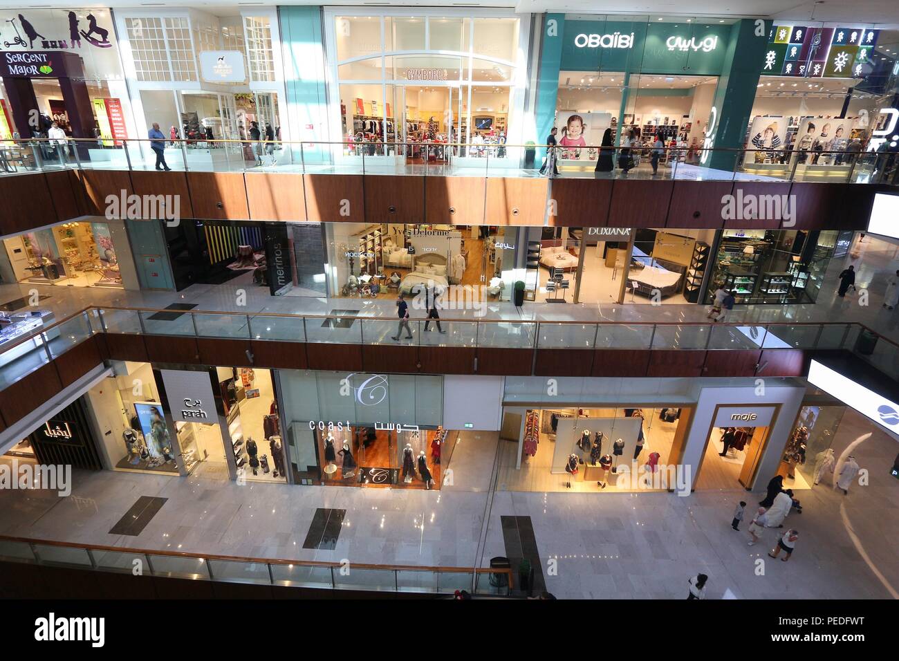 DUBAI, UAE - NOVEMBER 22, 2017: Shoppers visit Dubai Mall. It is the ...