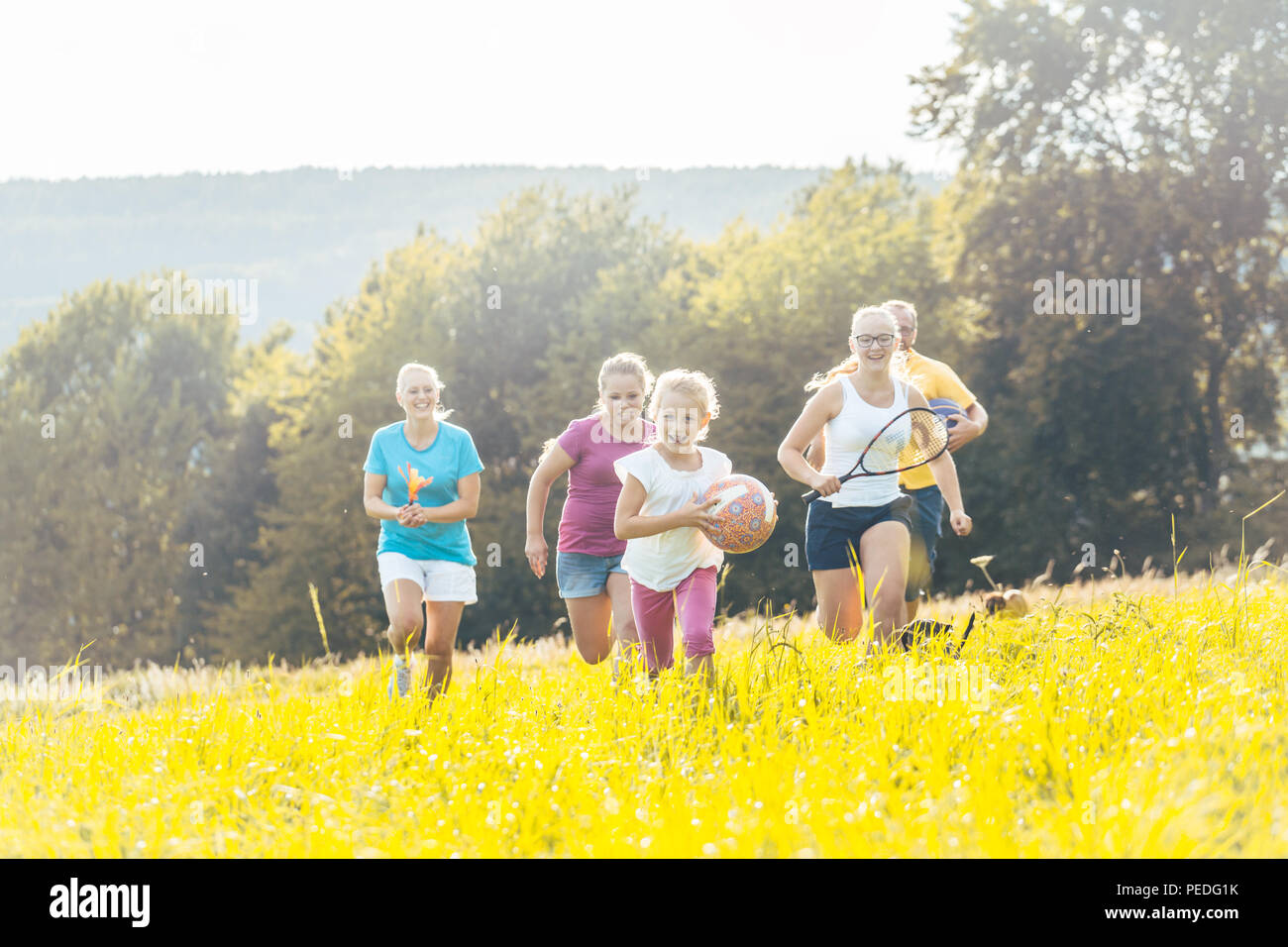 Parents children doing sport hi-res stock photography and images - Alamy