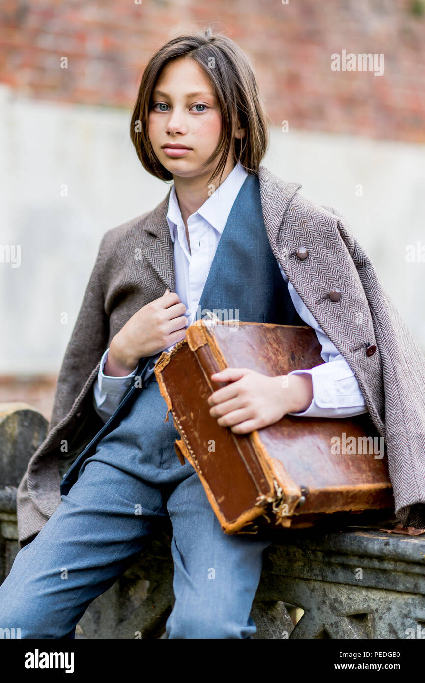 Beautiful child model Bailey works through different looks on a shoot ...