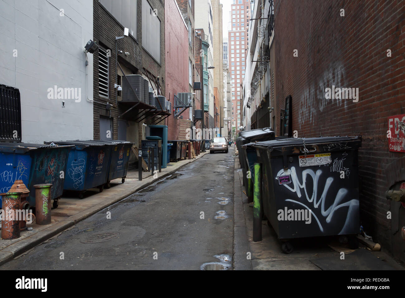 Large Garbage containers in a side street in Philadelphia, USA Stock ...