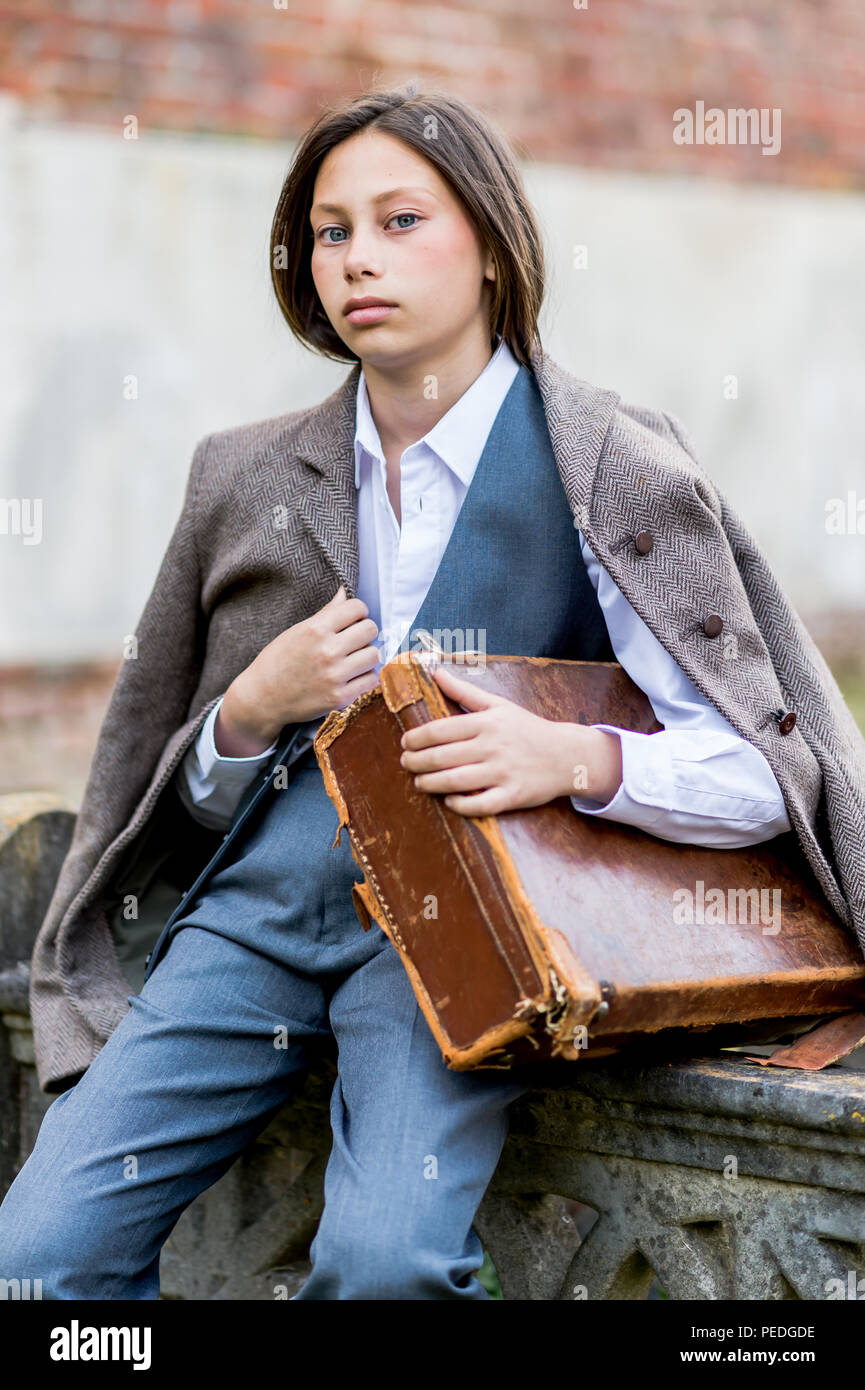 Beautiful child model Bailey works through different looks on a shoot ...