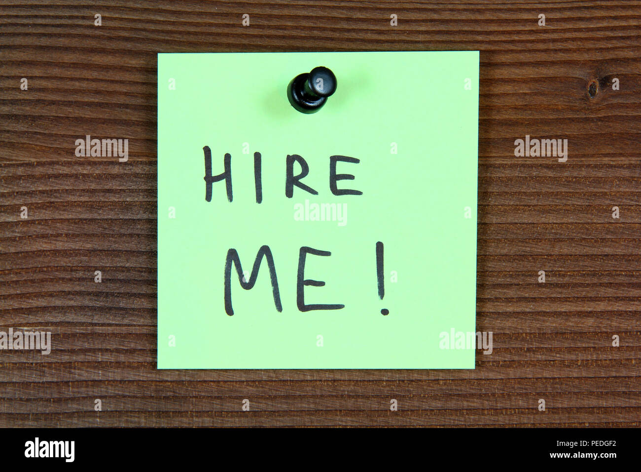 Sticky note with employment message - hire me. Unemployment concept ...