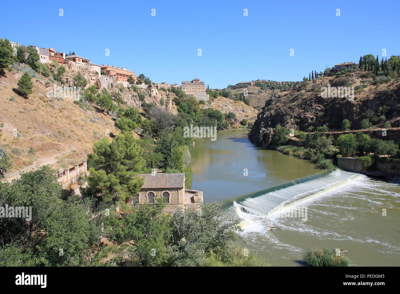 Toledo, Spain with Tagus river. The old town is a UNESCO World Heritage ...