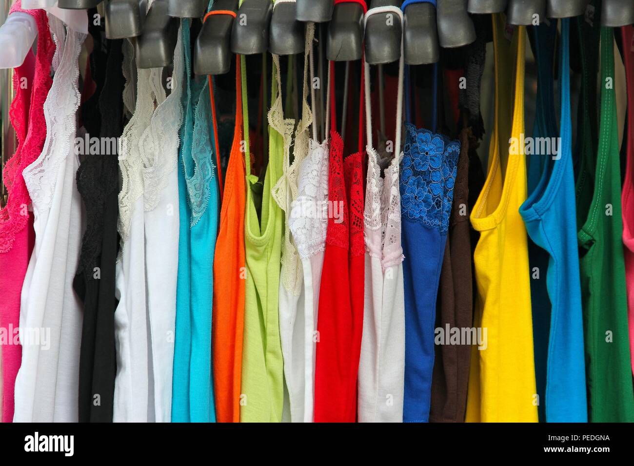 Fashion shopping in Bangkok - colorful blouses and dresses at a street ...