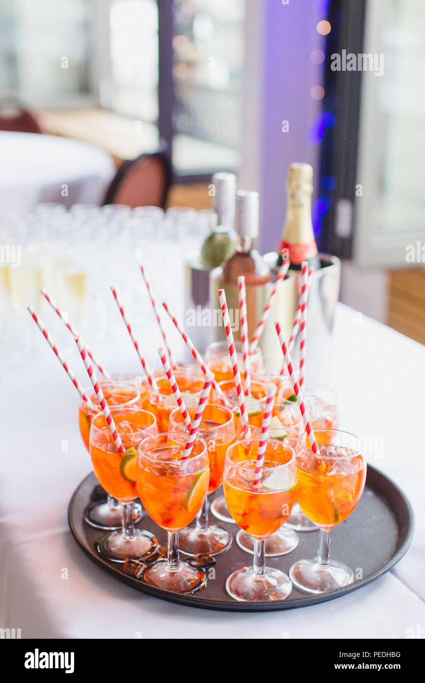 A tray of Aperol Sprtiz cocktails (Aperol. Prosecco and Soda water ...