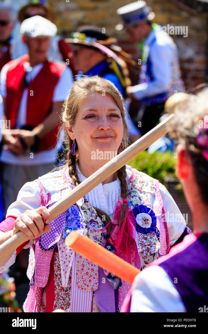 Traditional English folk dancer, woman morris dancer. Rising wooden ...