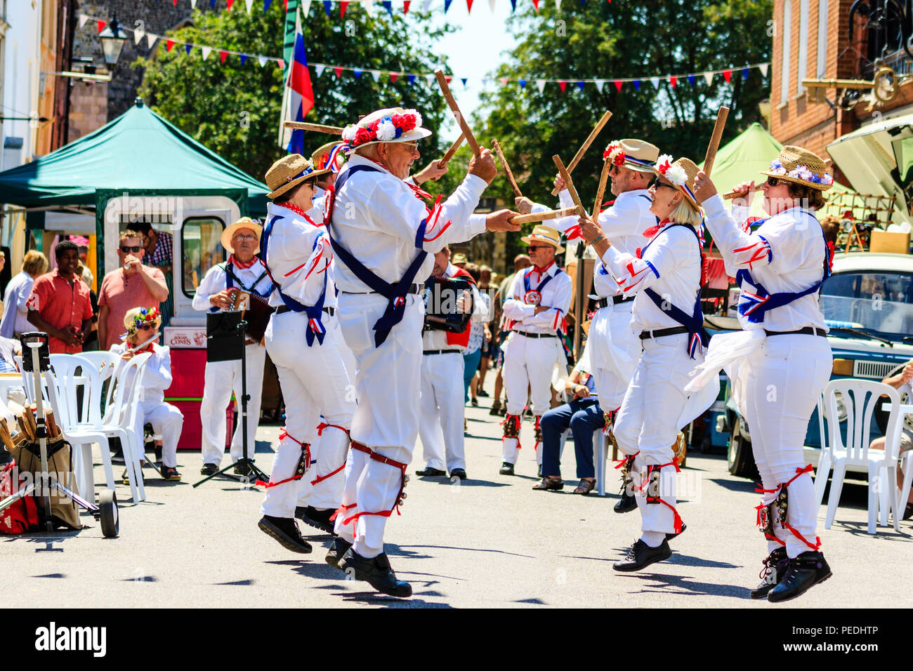 Traditional English folk dancers from the East Kent Morris side dancing ...