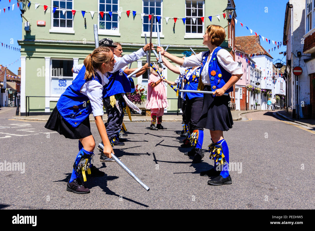 Traditional English folk dancers, the Royal Liberty Morris dance side ...