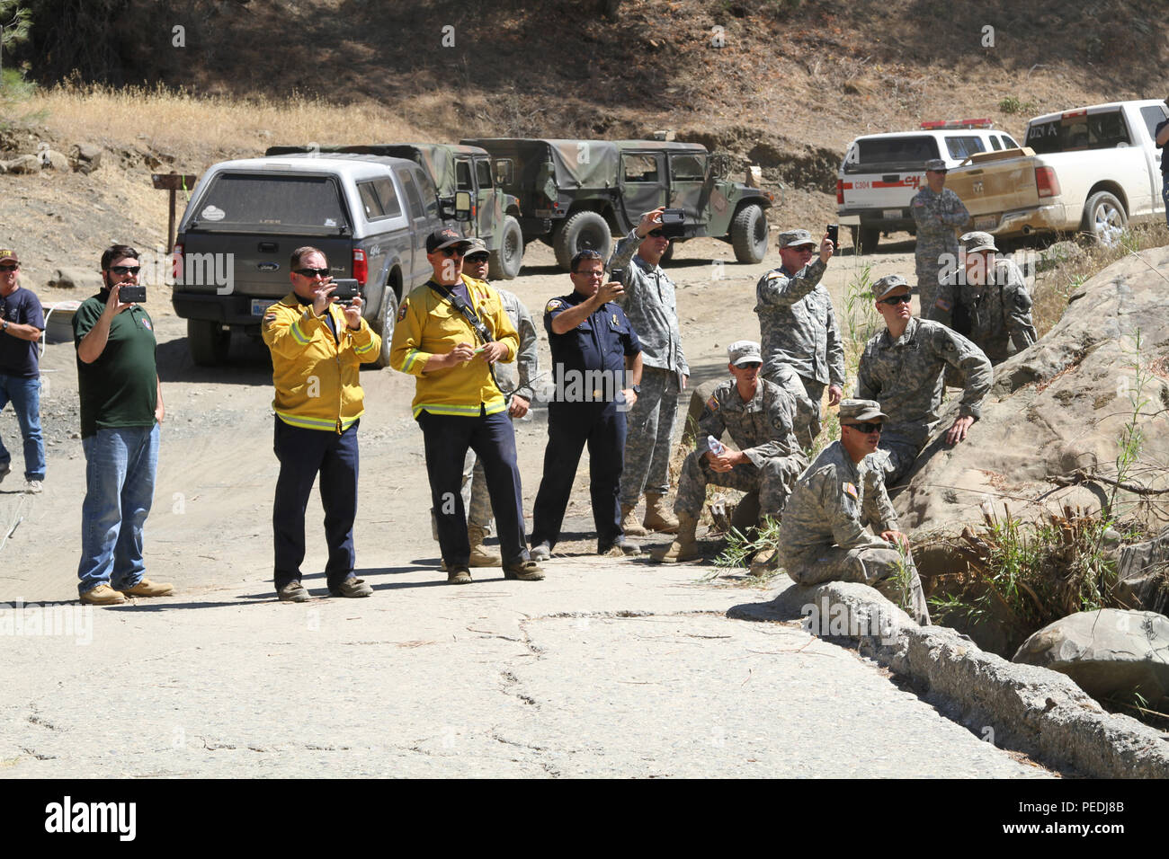 Civilians, CAL FIRE personnel and members of the California Army ...