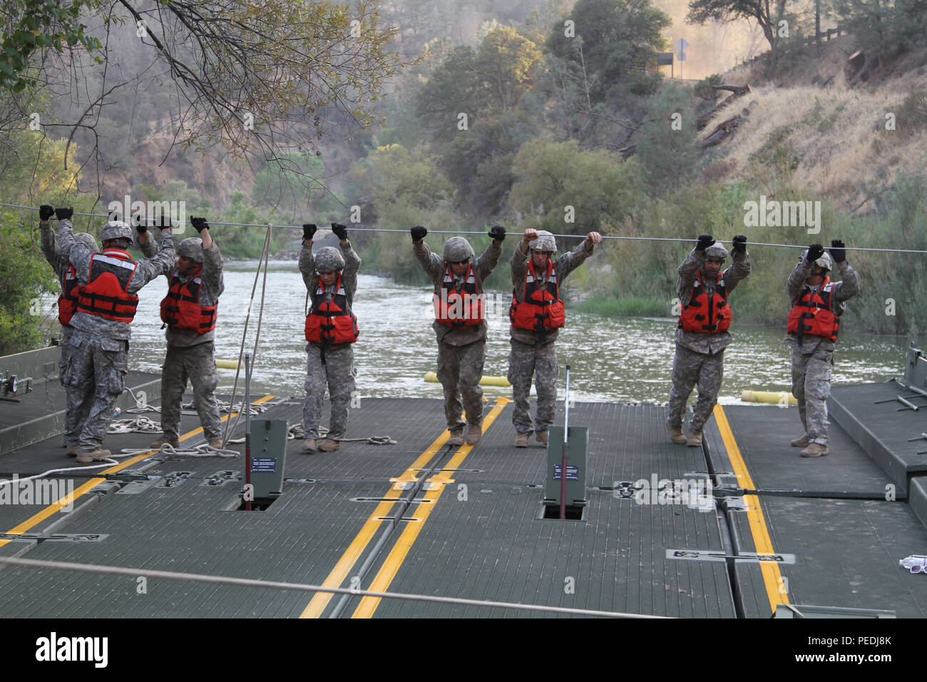 A launch and retrieve team from the 132nd Multirole Bridge Company ...
