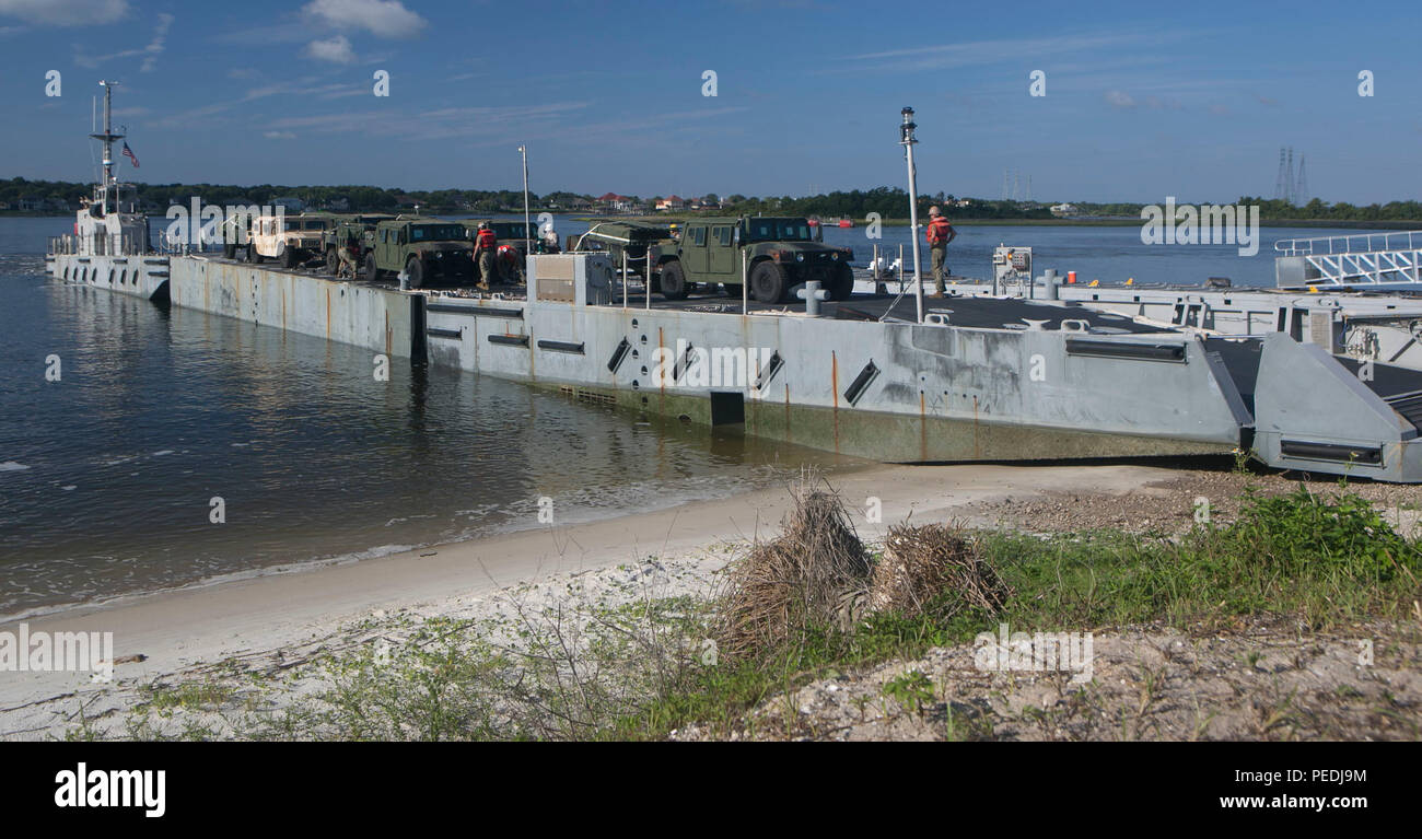 Marines with Combat Logistics Regiment 25, prepare to unload equipment ...