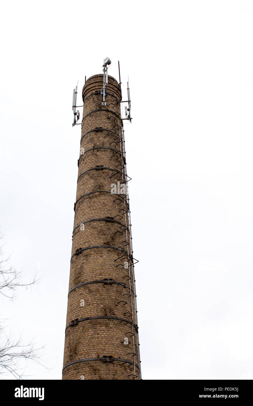 Brick tower. Factory tower of red brick Stock Photo - Alamy