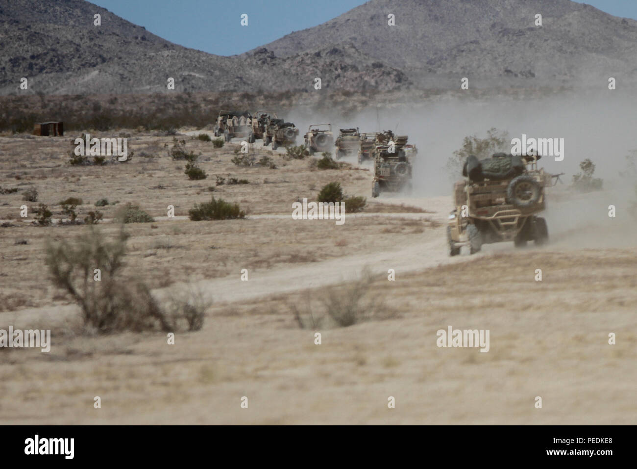 Ultra-lightweight combat vehicles bearing paratroopers assigned to the ...