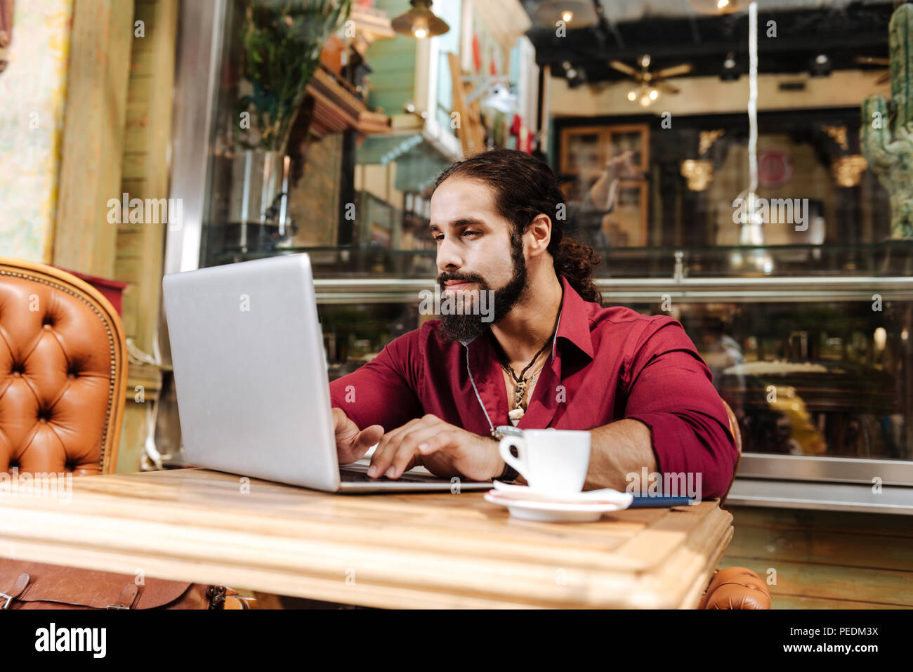 Bearded hispanic freelancer typing hi-res stock photography and images ...