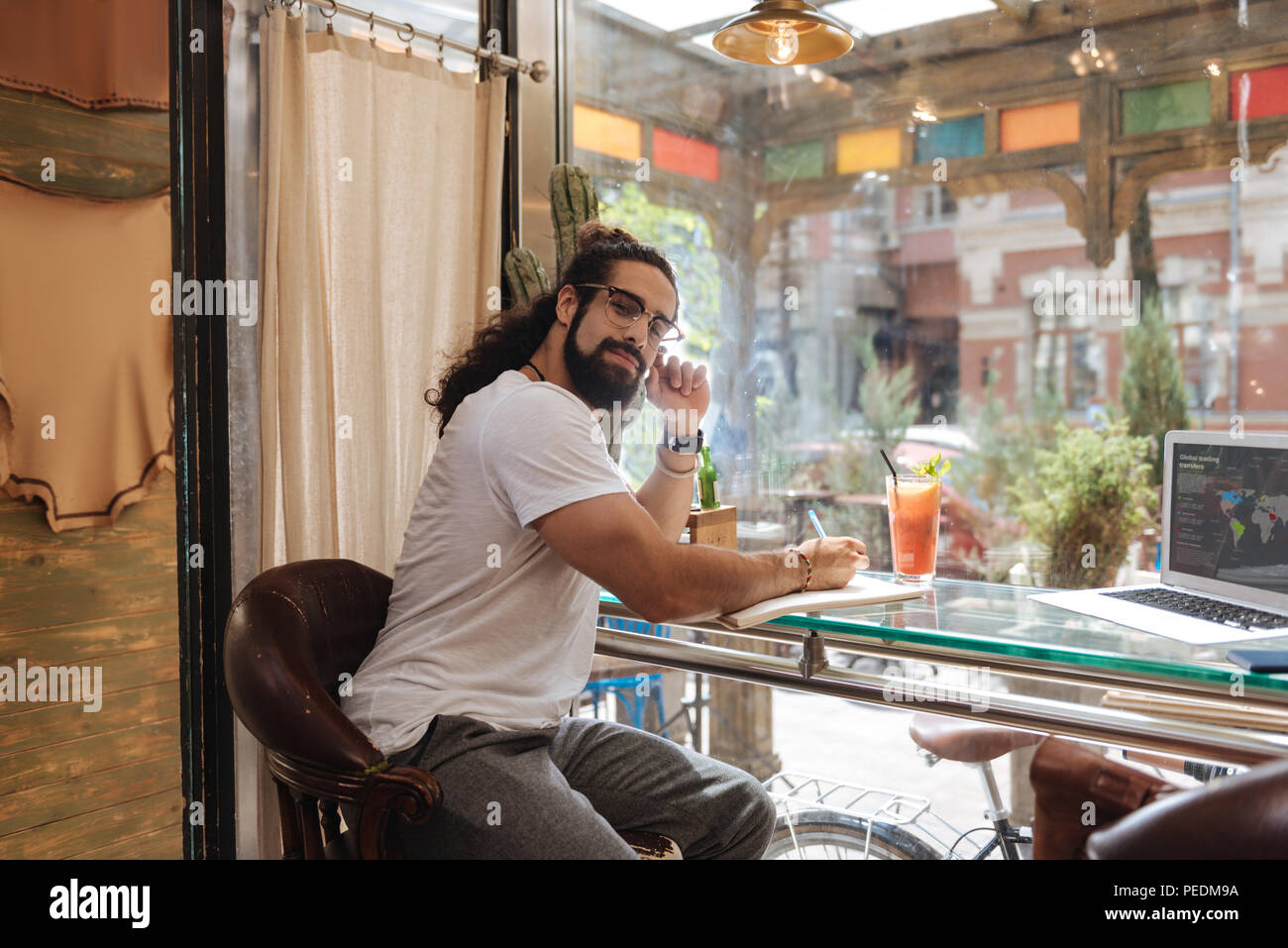 Handsome smart man writing Stock Photo - Alamy