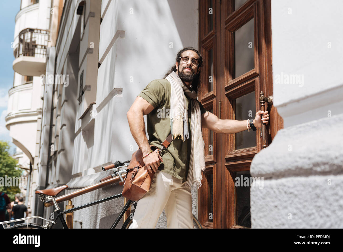 Holding door handle hi-res stock photography and images - Alamy