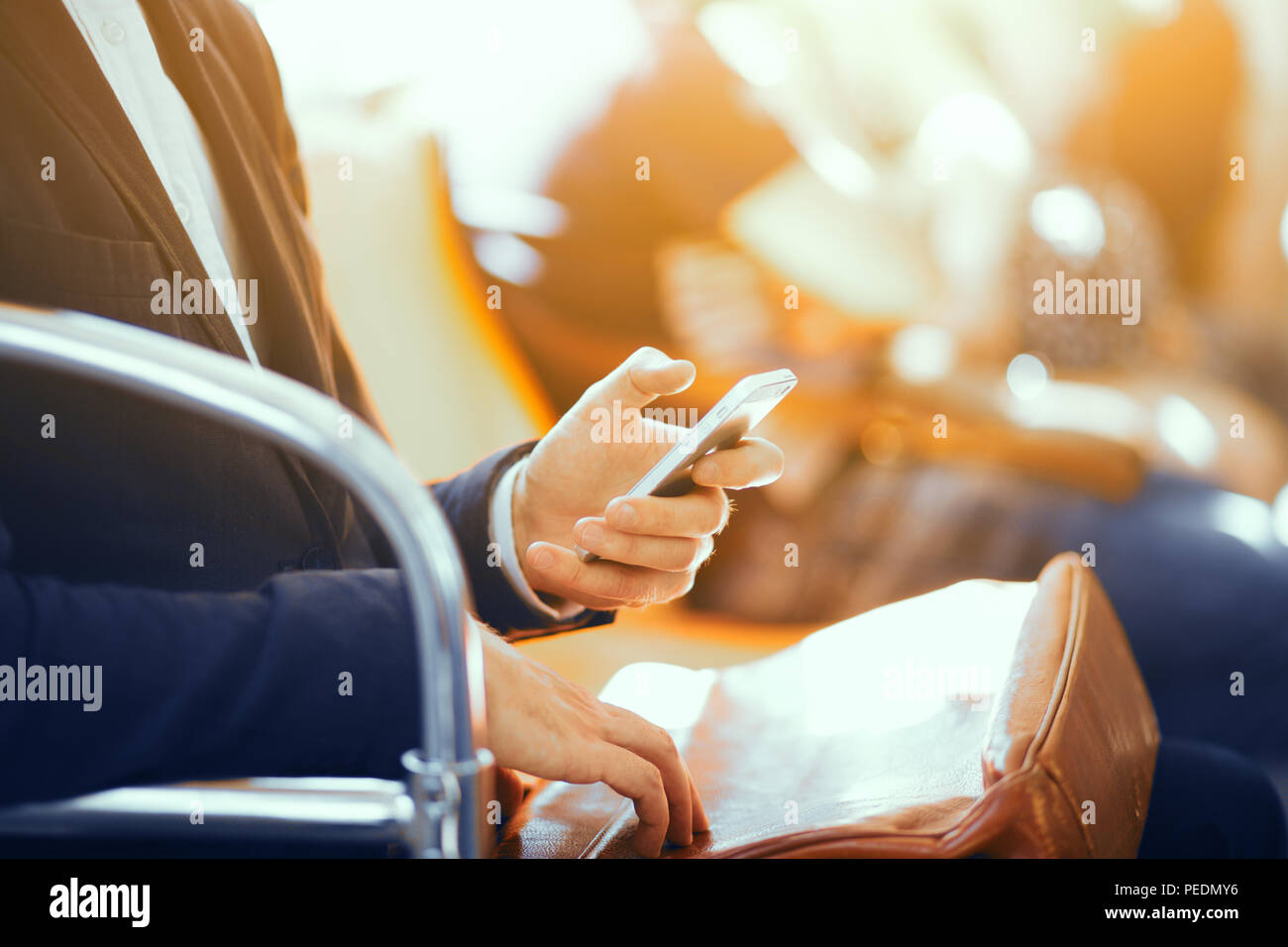 Person in subway train with phone hi-res stock photography and images ...