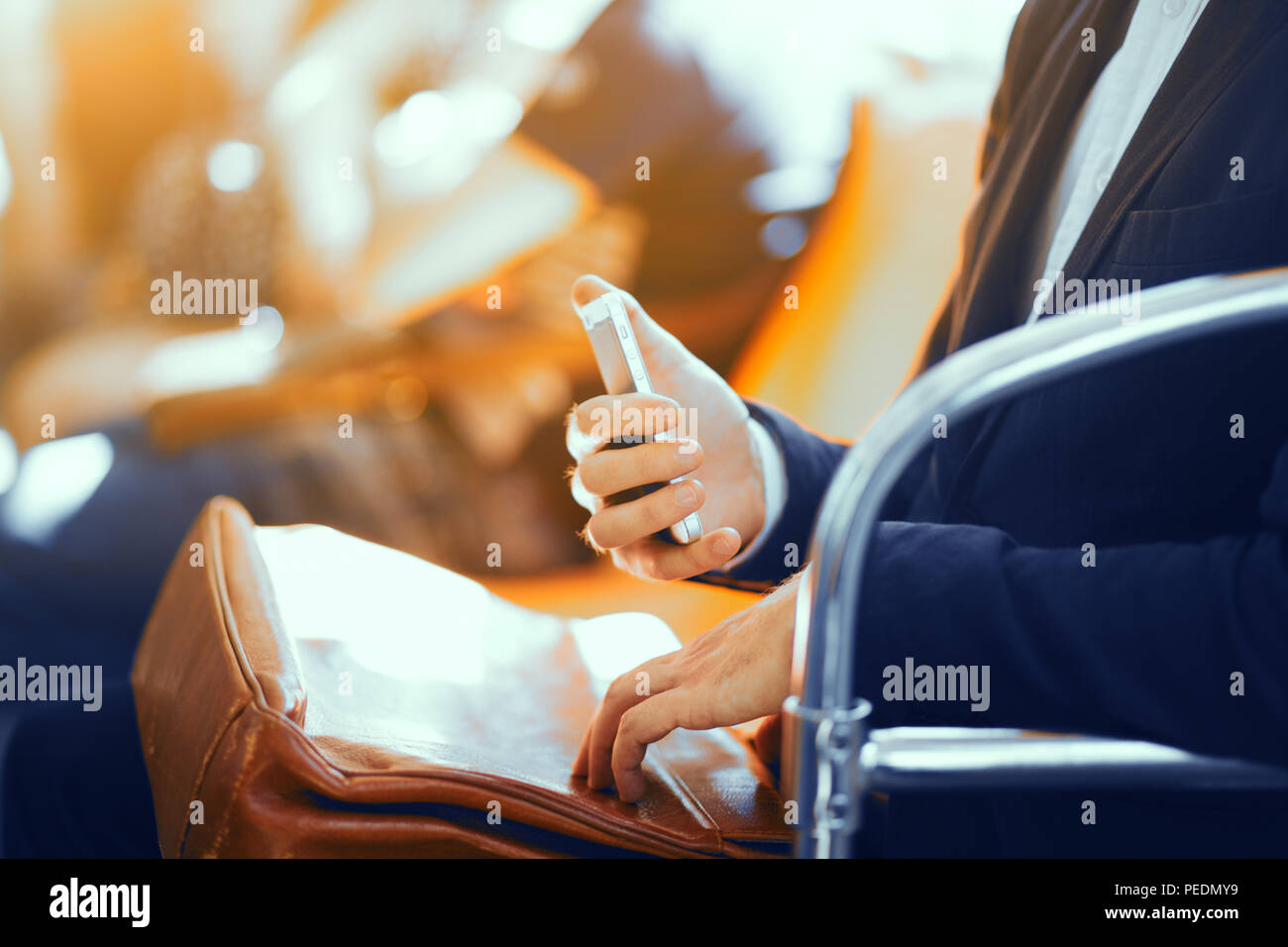 Person in subway train with phone hi-res stock photography and images ...
