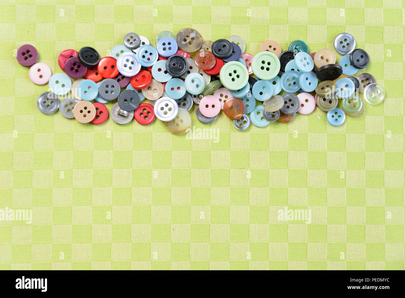 Colored small buttons on a green background 2018 Stock Photo - Alamy