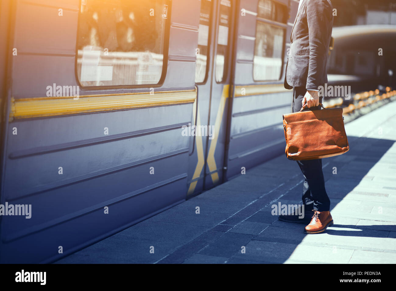 Man in commuter train subway hi-res stock photography and images - Alamy