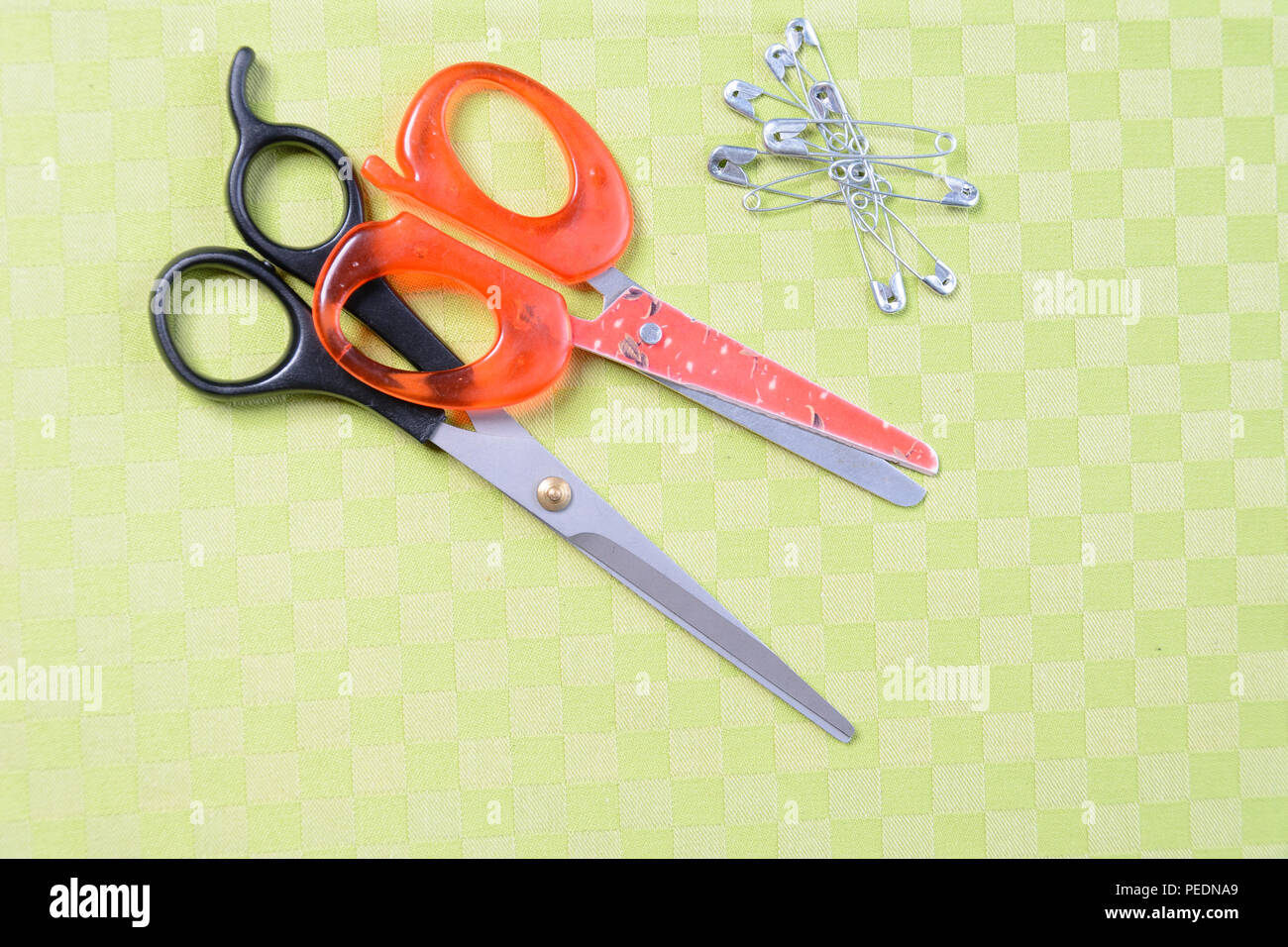 Scissors and threads on fabric, top view Tailoring equipment 2018 Stock ...