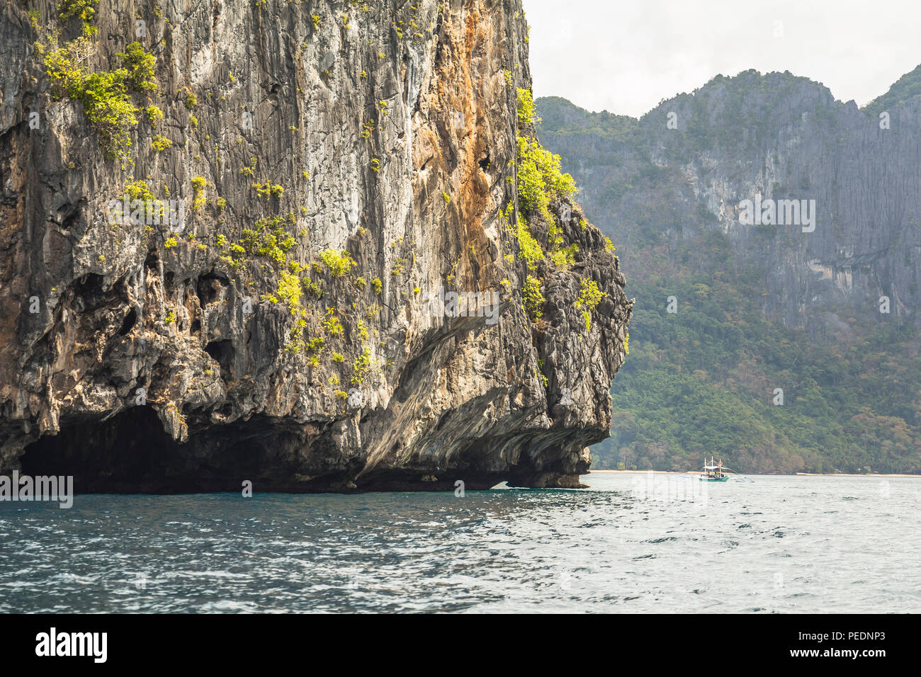 Karst rocks in the water of philippine sea Stock Photo - Alamy