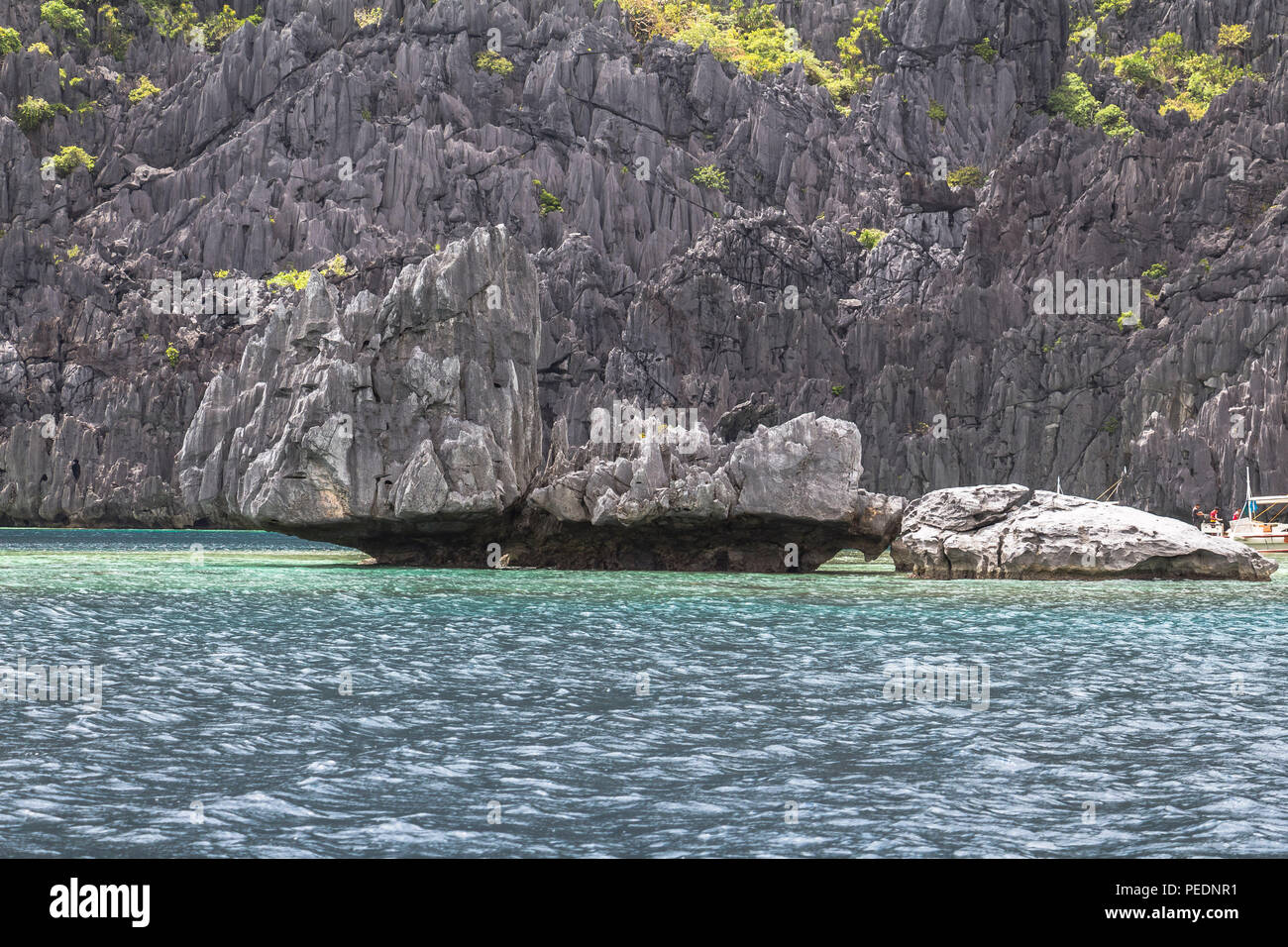 Karst rocks in the water of philippine sea Stock Photo - Alamy