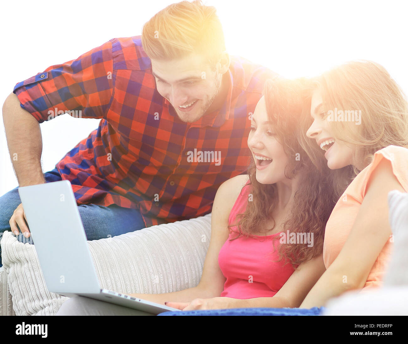 portrait of a group of young people watching videos on the laptop Stock ...