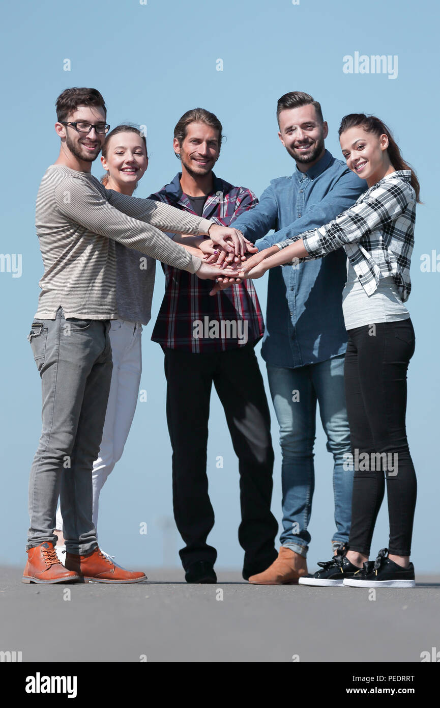 group of young people clasped their hands together Stock Photo - Alamy