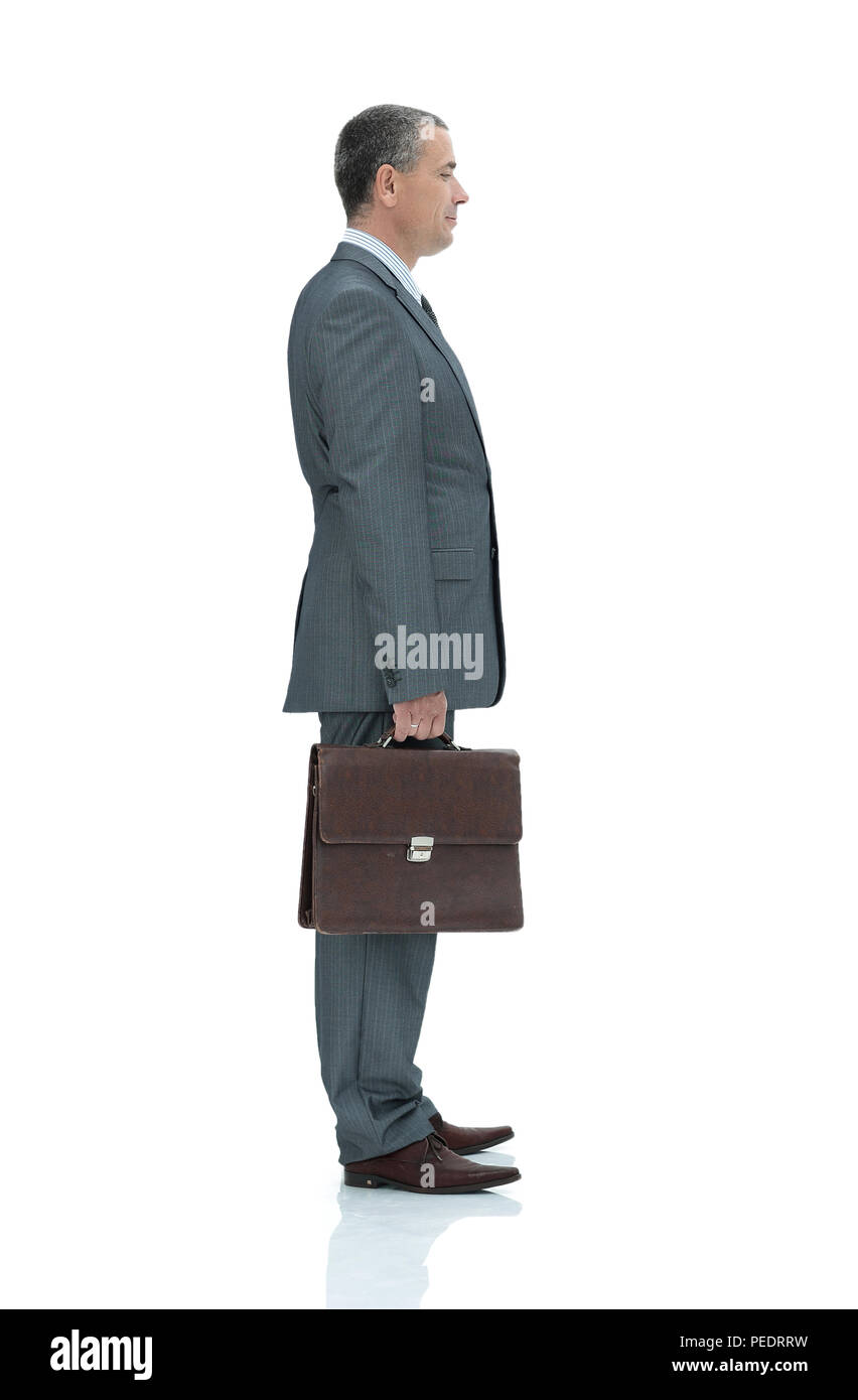 side view.confident businessman with briefcase Stock Photo - Alamy