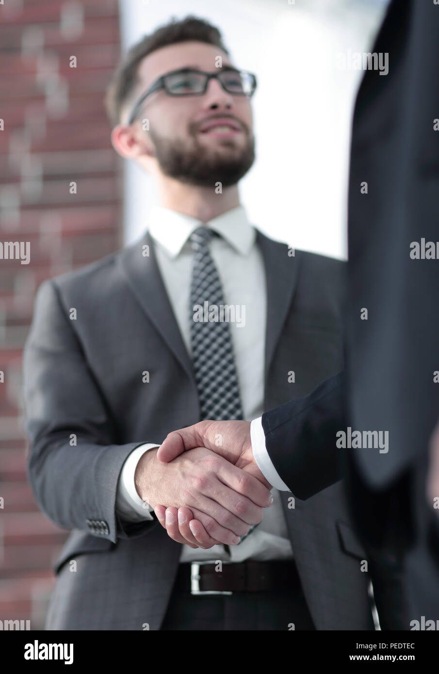 Business men giving a handshake. Business concept Stock Photo - Alamy