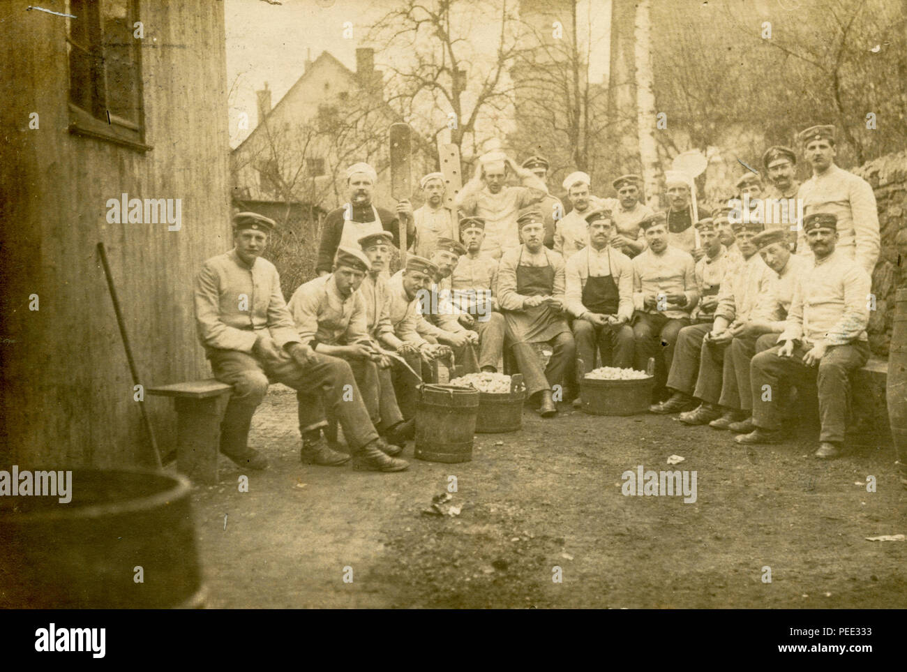 German soldiers peeling potatos Stock Photo - Alamy