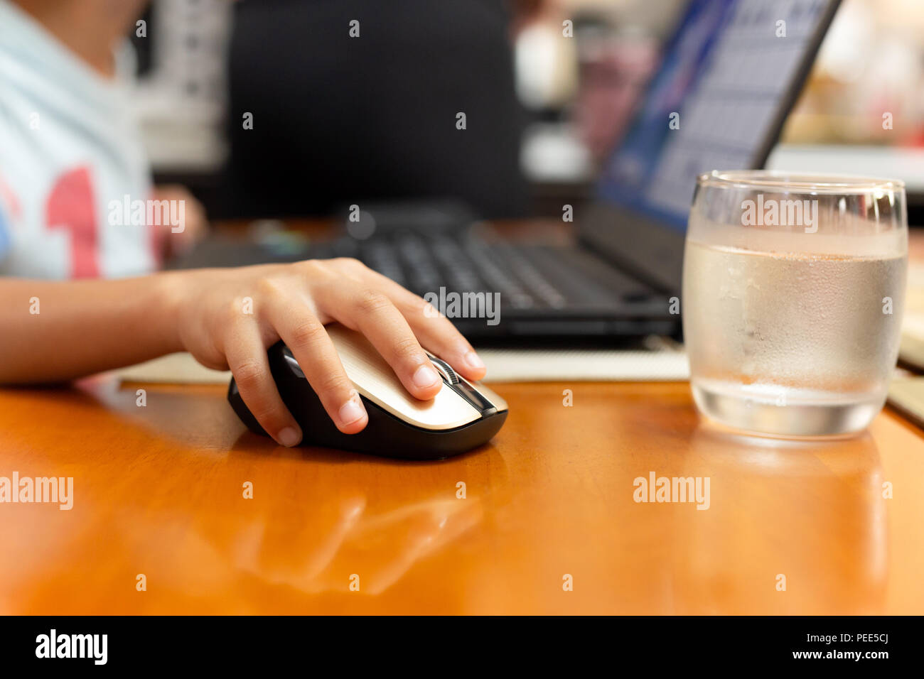 Kid using mouse hi-res stock photography and images - Alamy