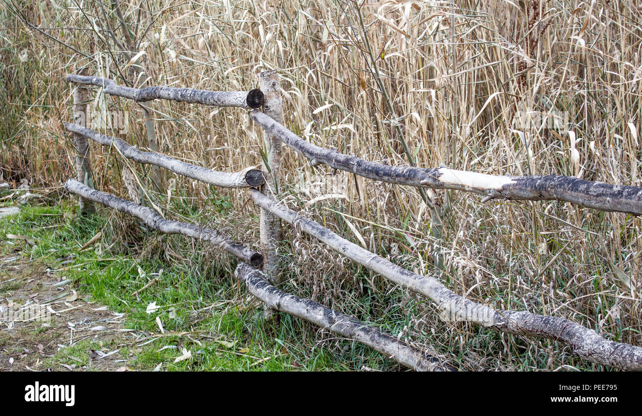 Wooden fence near the river in the ancient style Stock Photo - Alamy