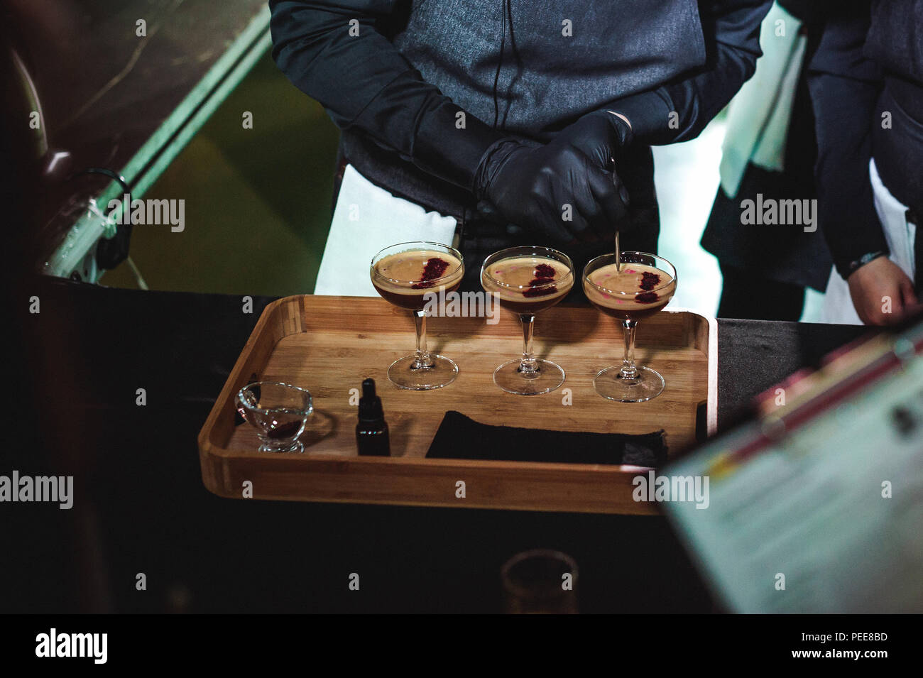 championship among coffee houses, members of teams show barista's skill ...