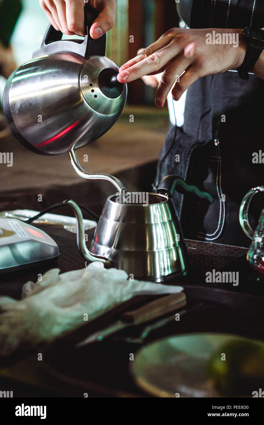 championship among coffee houses, members of teams show barista's skill ...