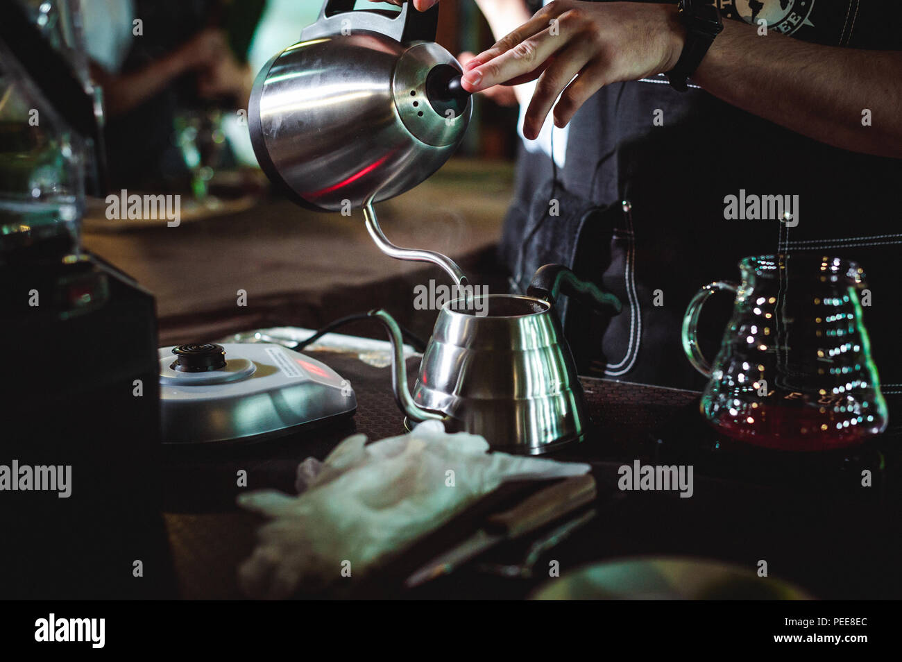championship among coffee houses, members of teams show barista's skill ...