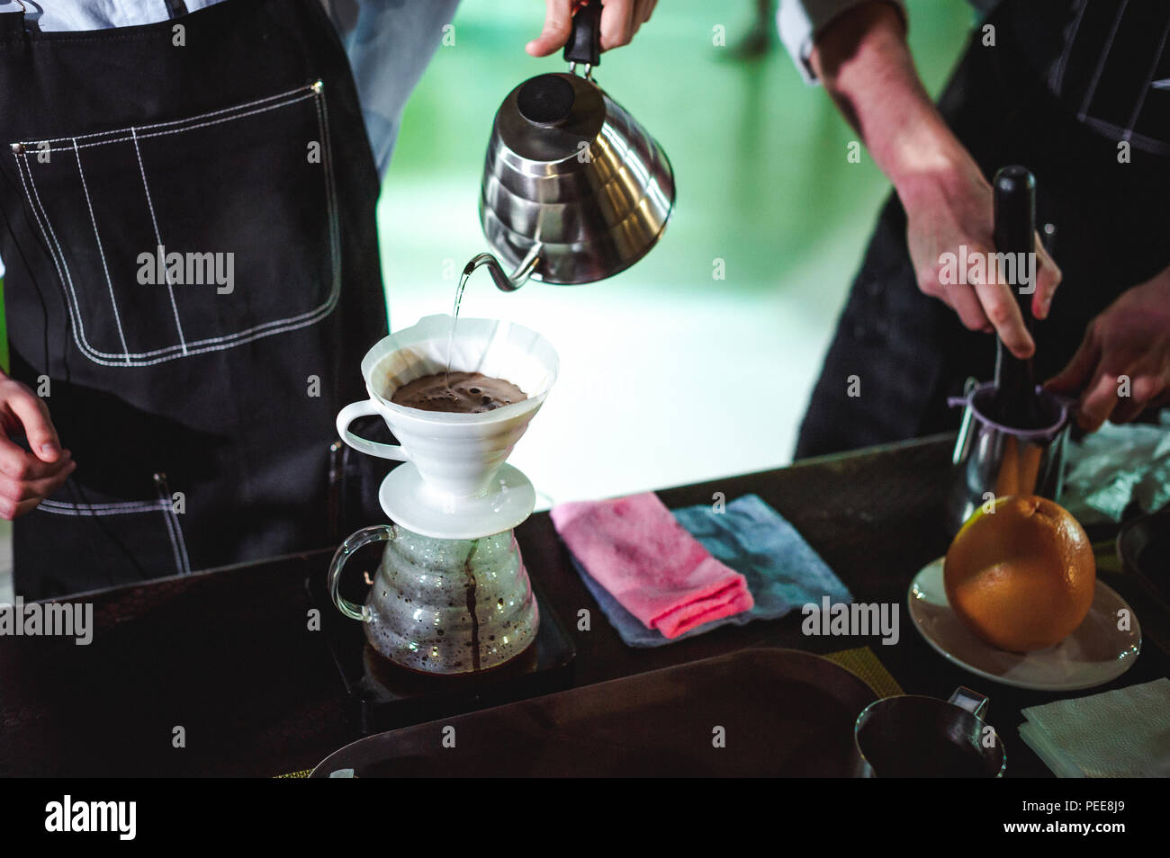 championship among coffee houses, members of teams show barista's skill ...