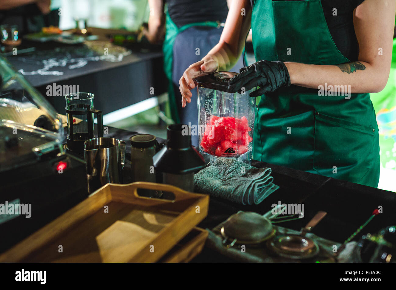 championship among coffee houses, members of teams show barista's skill ...